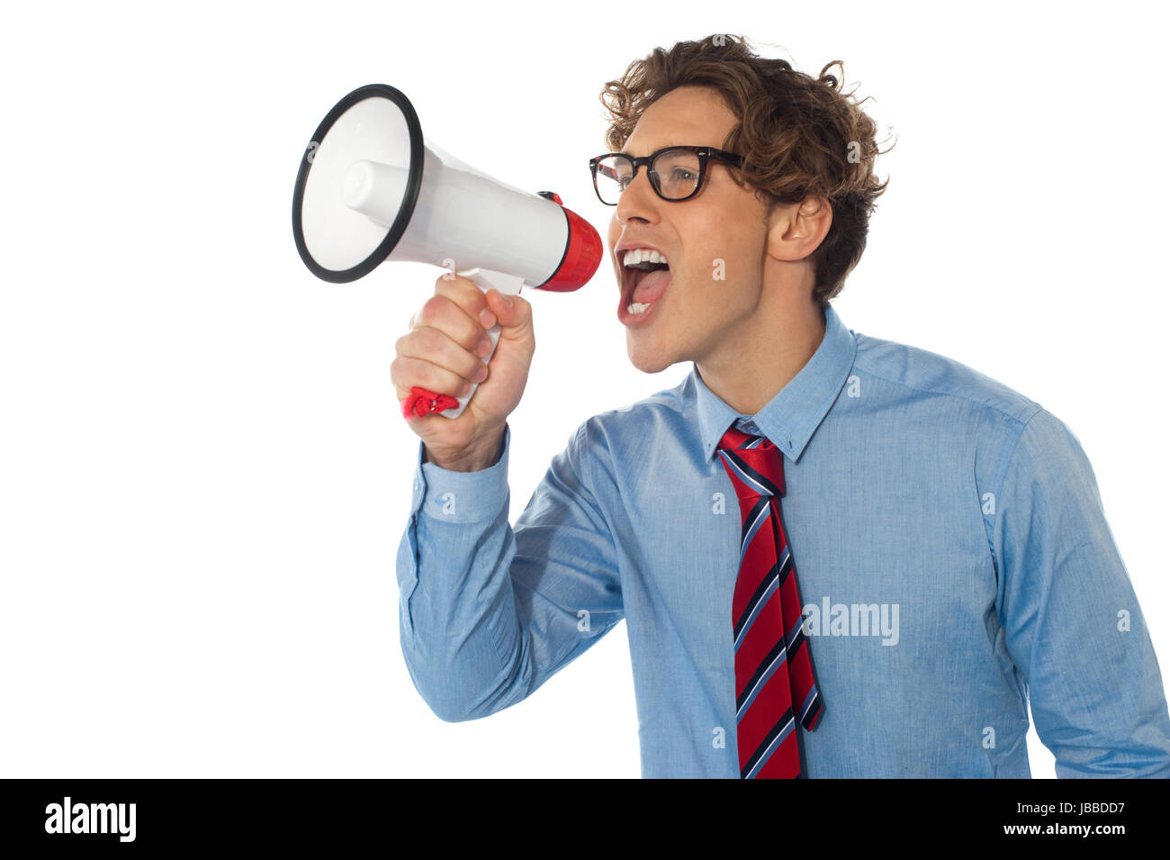 Young businessman using megaphone isolated over white background Stock ...