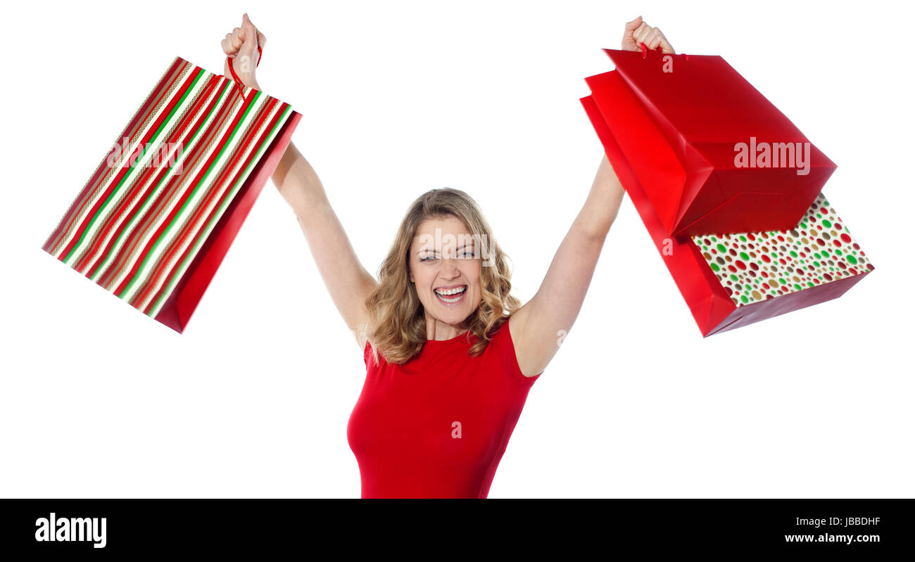 Shopaholic teenager excited after shopping Stock Photo - Alamy
