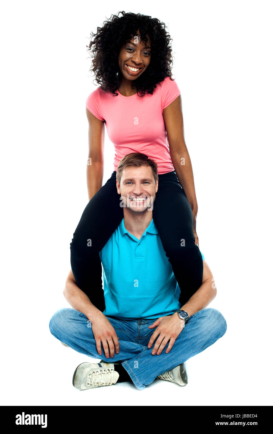 Girl sitting on mans shoulders hi-res stock photography and images - Alamy