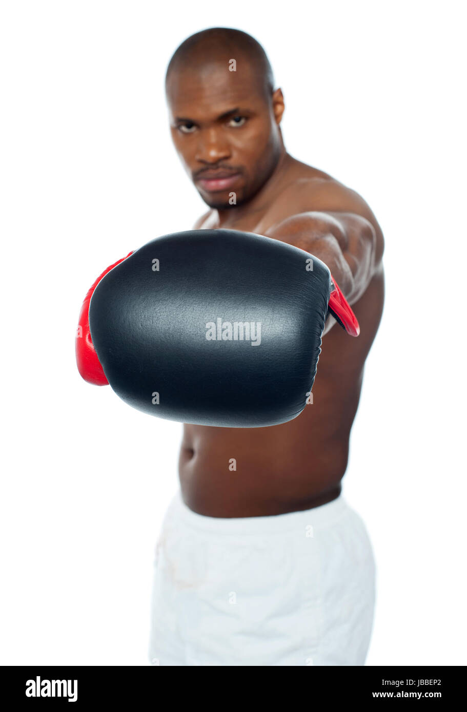 Muscular black boxer punching right into camera. Feel the heat Stock ...