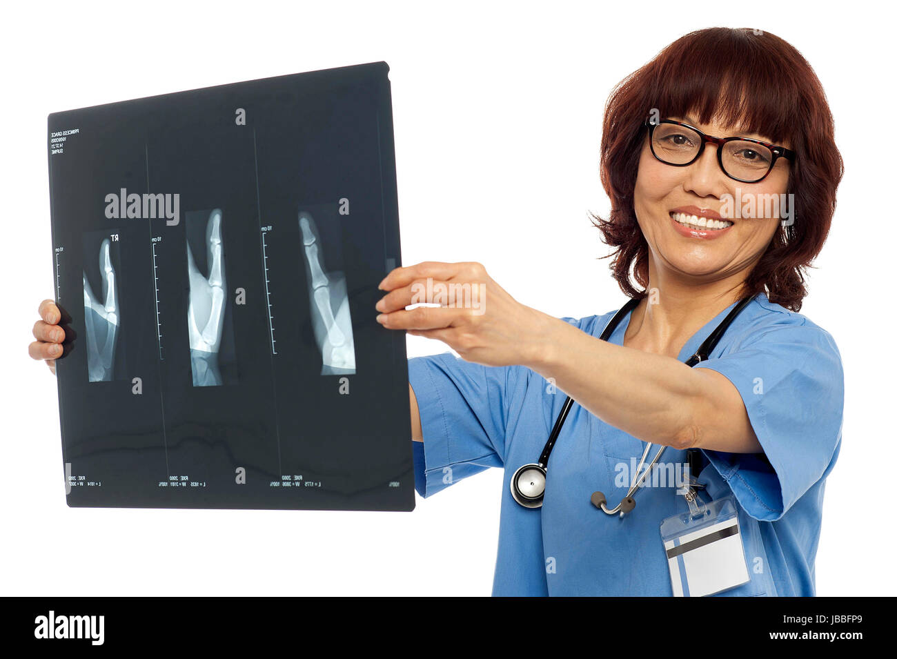 Doctor holding x-ray report. Analyzing it. All on white background ...