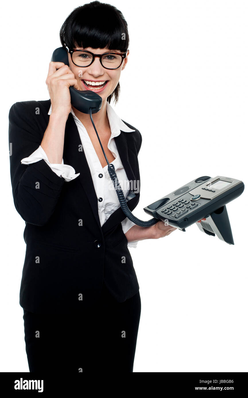 Professional lady speaking on phone. Enjoying her conversation Stock ...