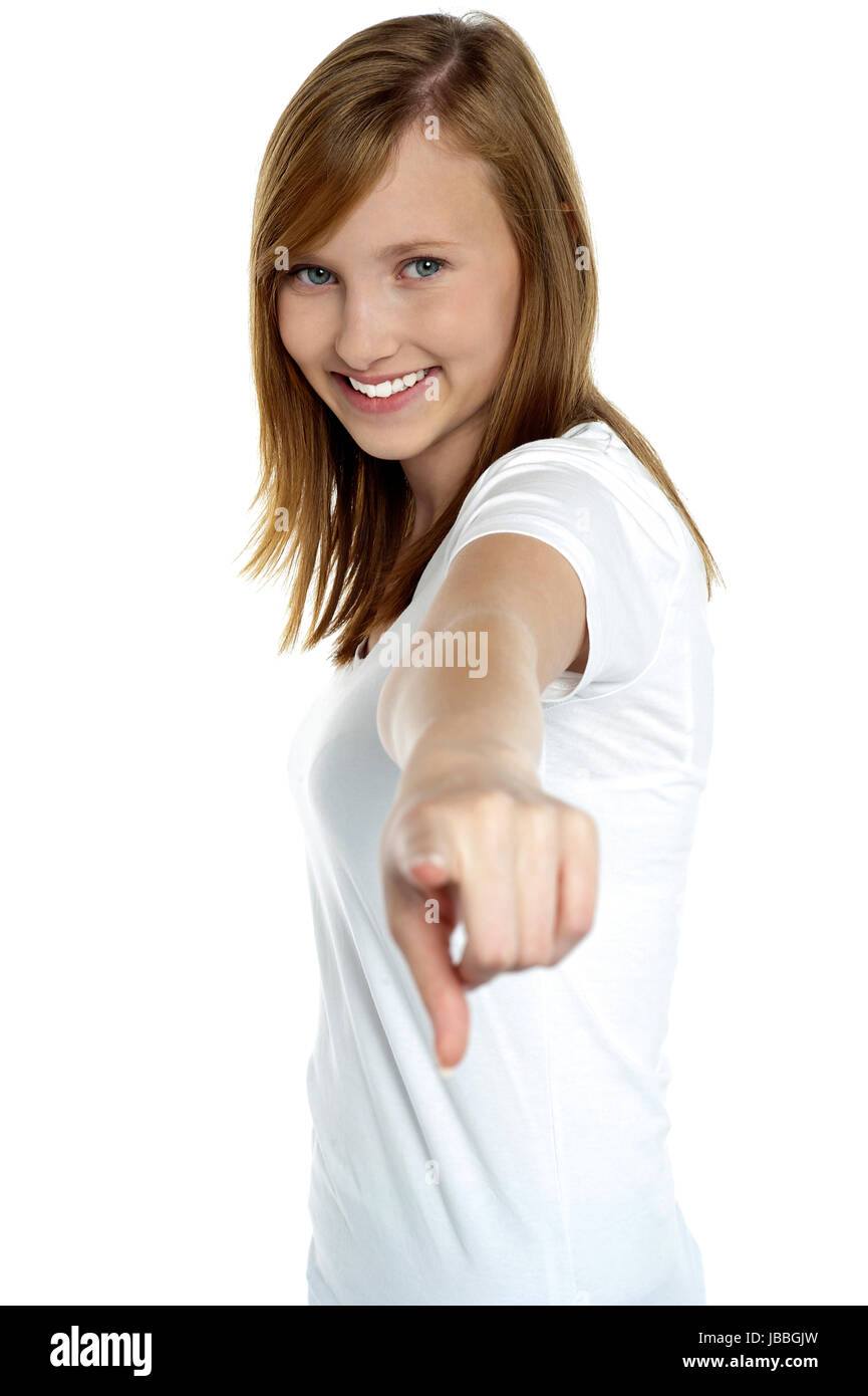 Trendy teenager girl pointing towards the camera Stock Photo - Alamy