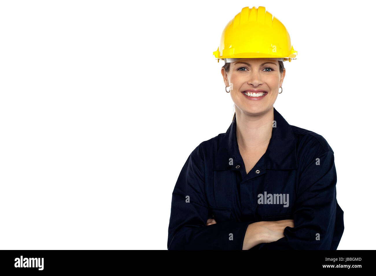 Beaming construction worker wearing yellow safety helmet. Cheerful portrait Stock Photo - Alamy