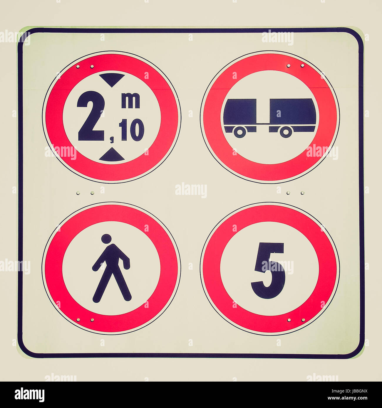 Vintage retro looking Road traffic signs isolated over white background ...