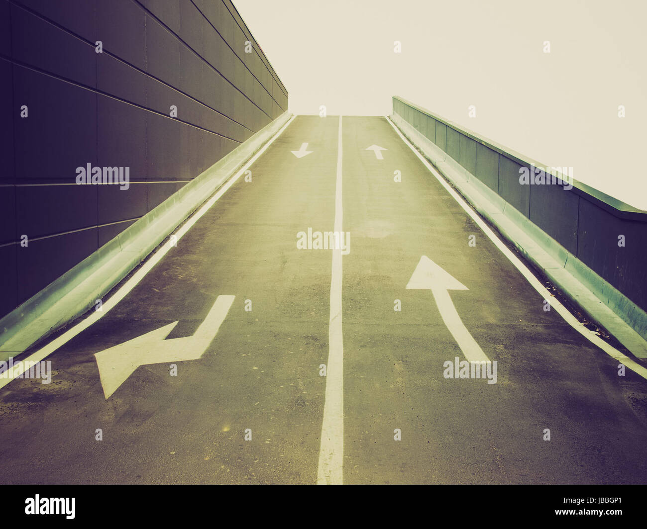 Vintage retro looking Garage access ramp with two lanes with arrow ...