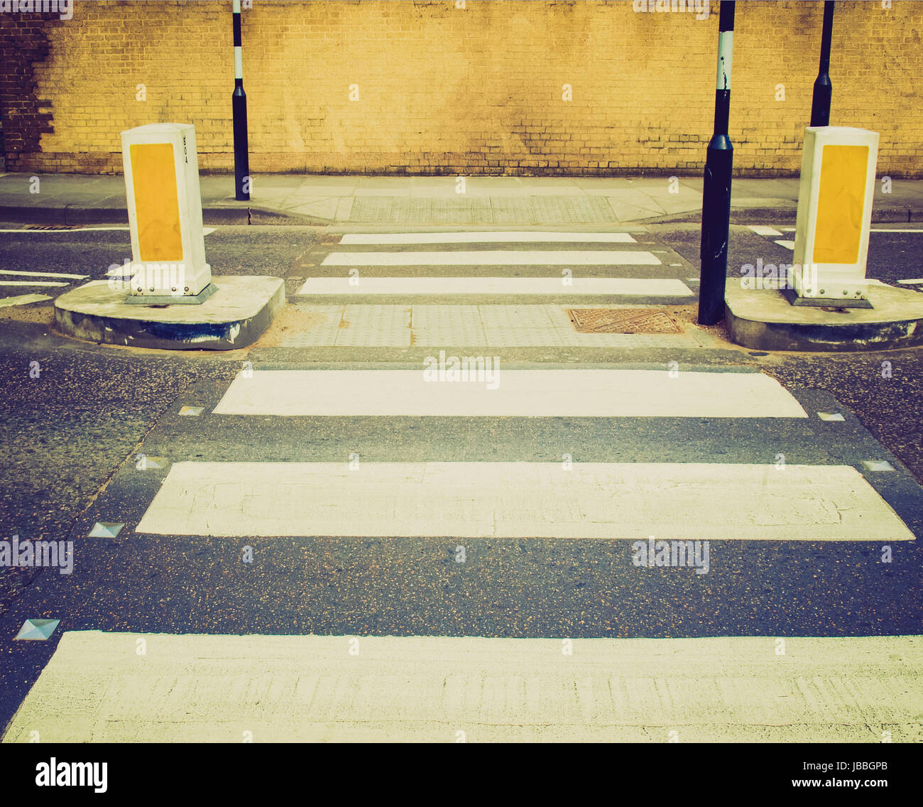 Vintage retro looking Zebra crossing pedestrian traffic sign on a road ...