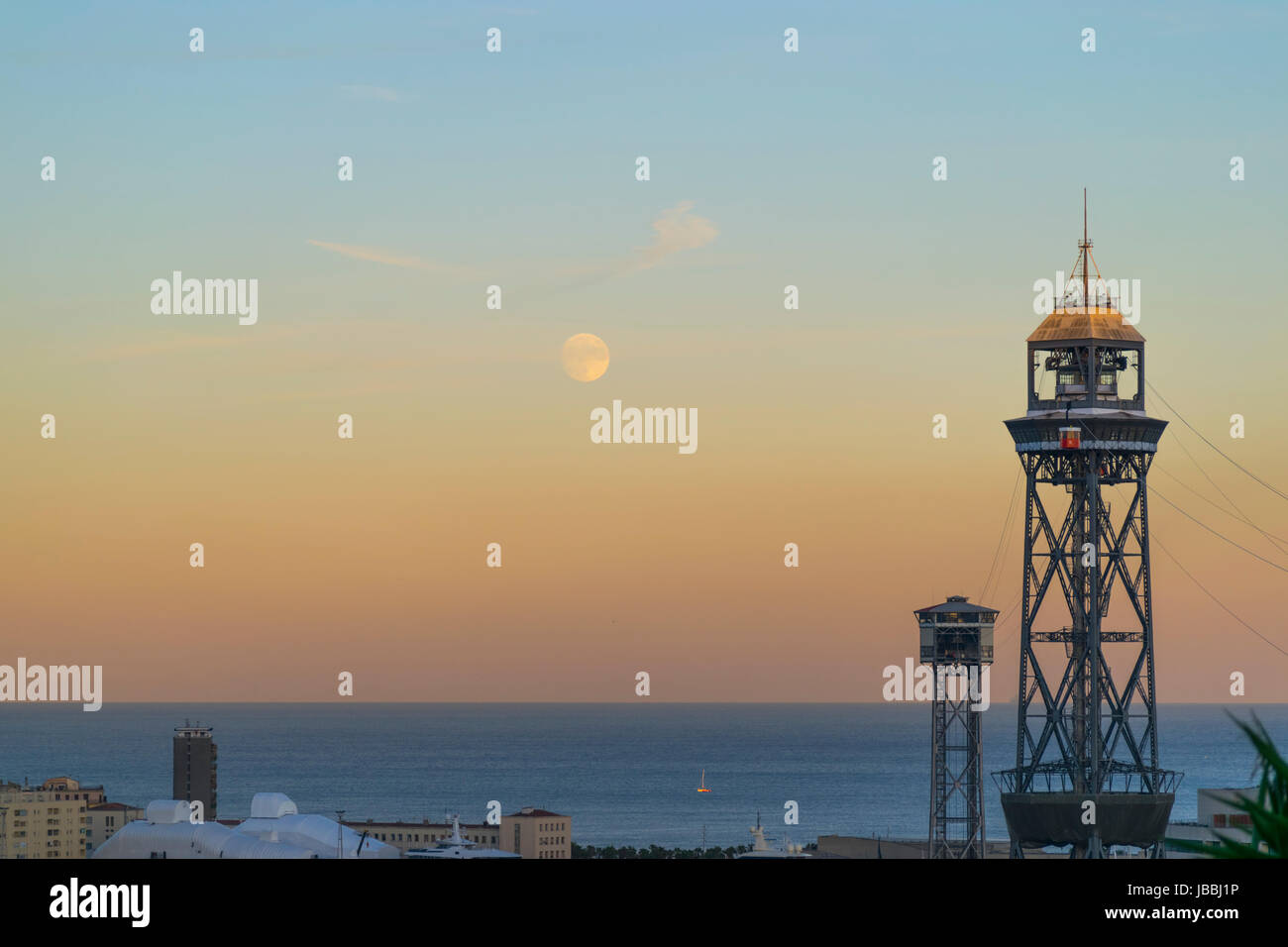 Barcelona sunset bay view with lighthouse and moon Stock Photo - Alamy
