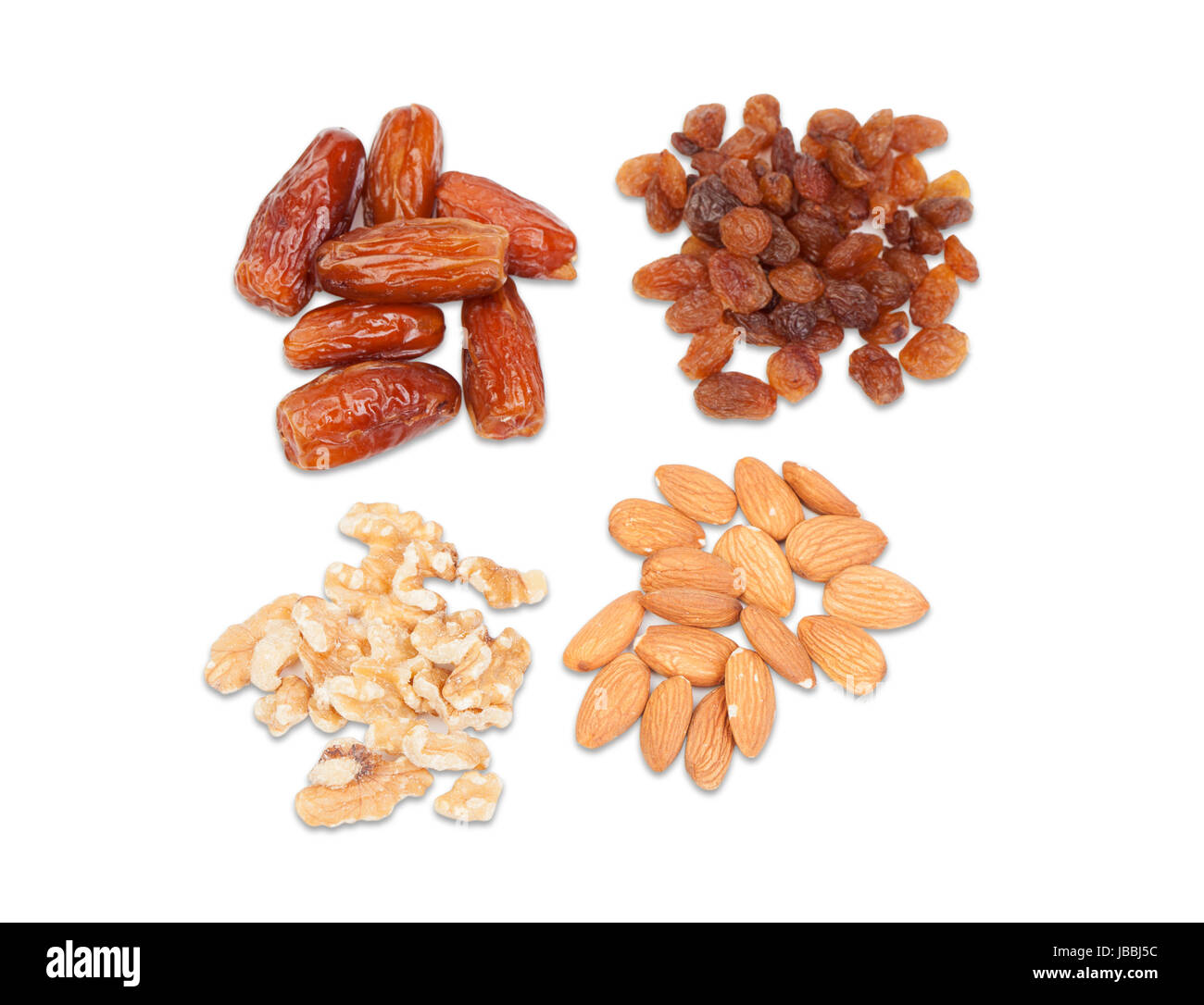 Raisins, nuts, dates and almonds isolated on a white background Stock ...