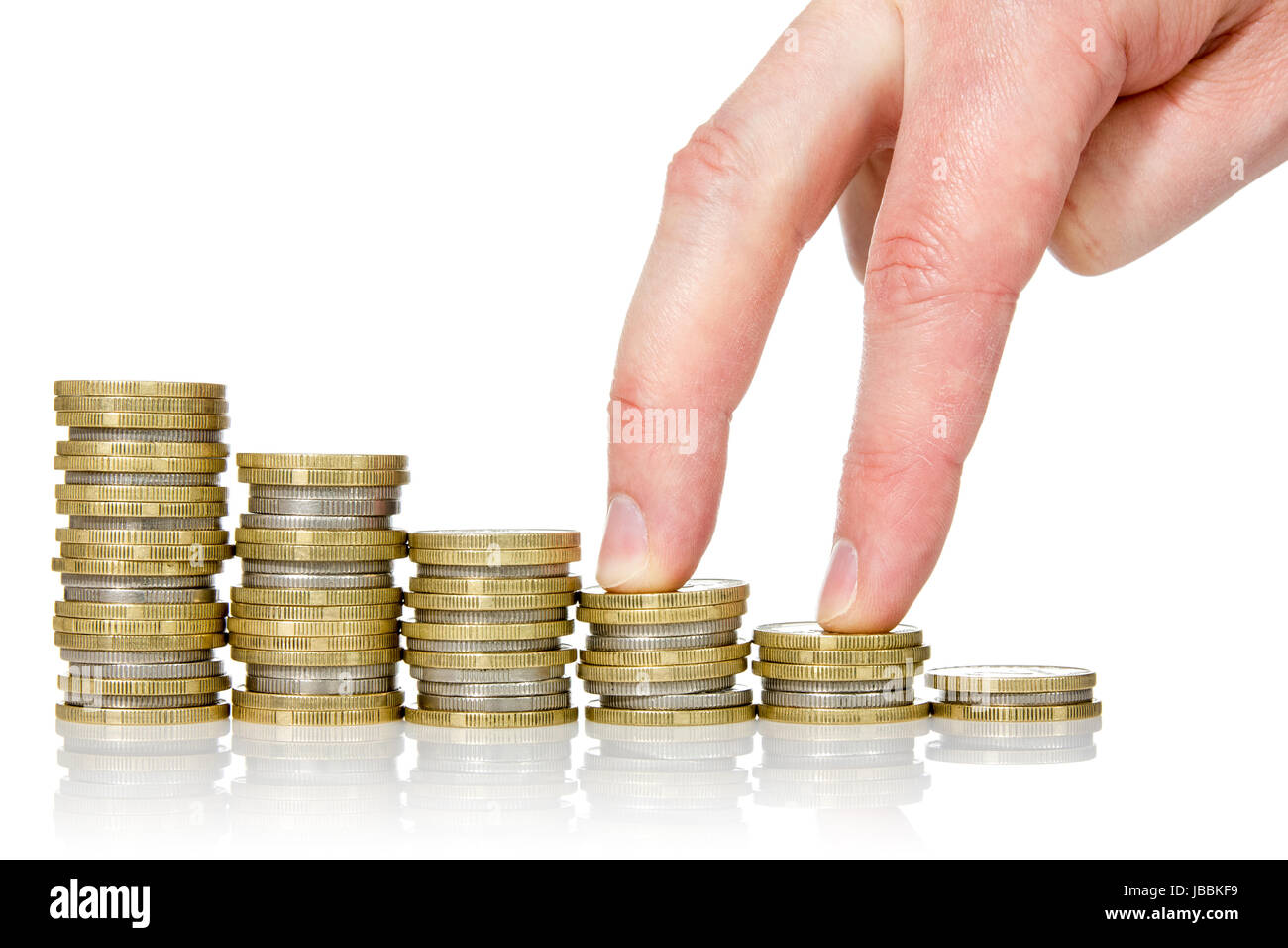 Growth concept. Fingers walking up on coins stairs, isolated over a ...