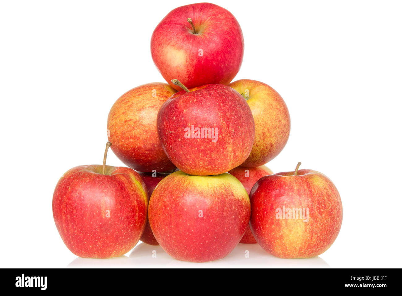 Pyramid of red apples isolated on white background Stock Photo - Alamy