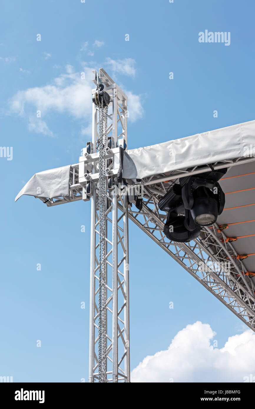 street stage spotlights on blue clean sky background Stock Photo - Alamy