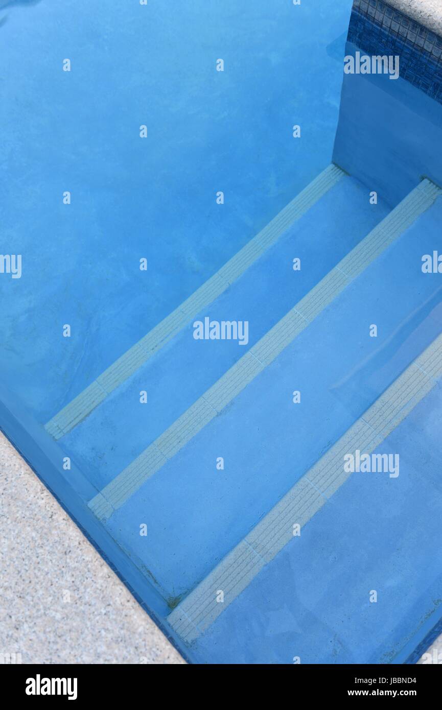 A close up image of pool steps Stock Photo - Alamy