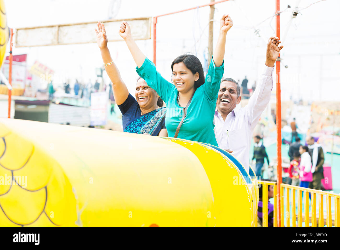 Happy Family Parents With Daughter Ride Jhula Fair In Suraj Kund Stock ...