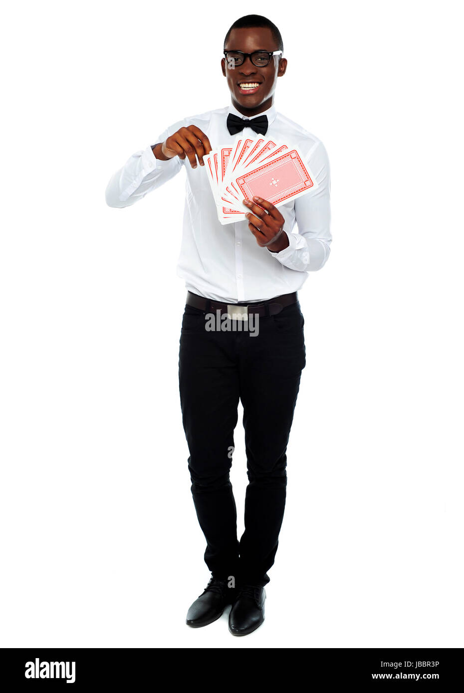Full length portrait of a young man holding cards Stock Photo - Alamy