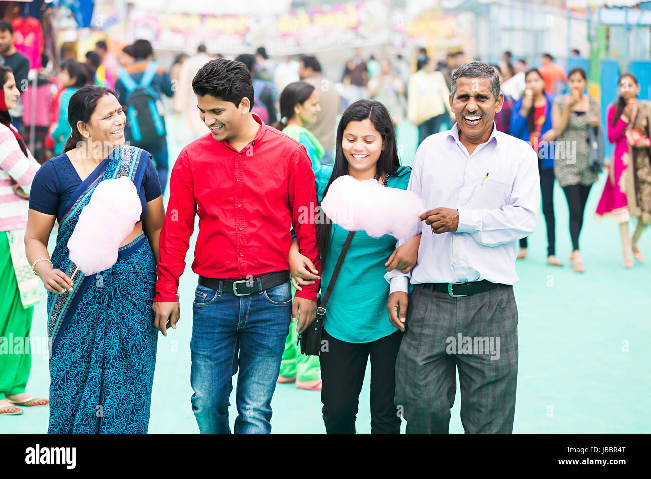 Parents and their daughter eating food hi-res stock photography and ...
