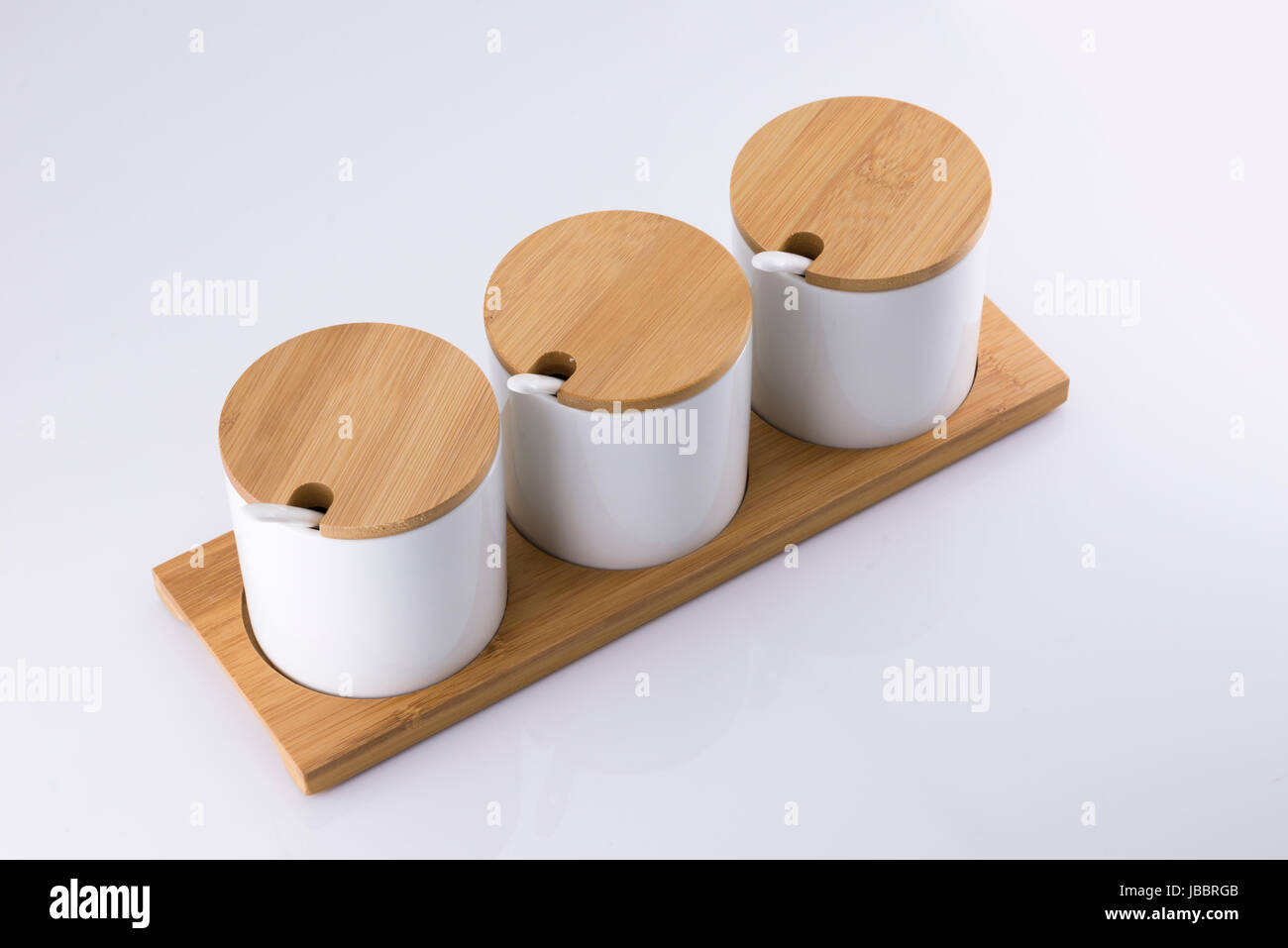 Three ceramic cups, for placing the spice Stock Photo - Alamy