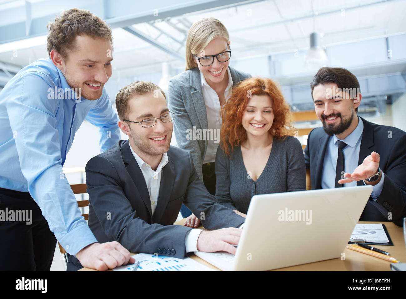 Image of a young business team working out strategy together Stock ...