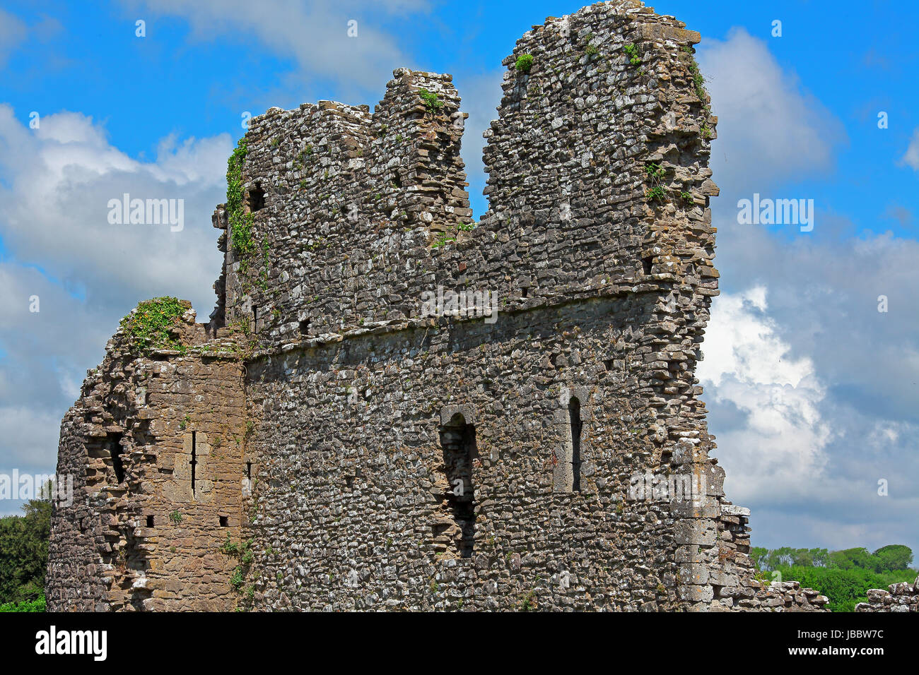 Remains of "Ogmore" castle alongside the "Ewenny" river showing its ...
