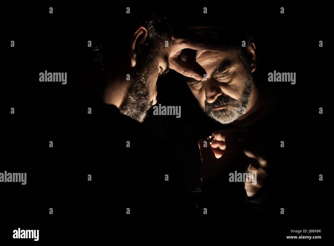 Sad Man Looking In The Mirror