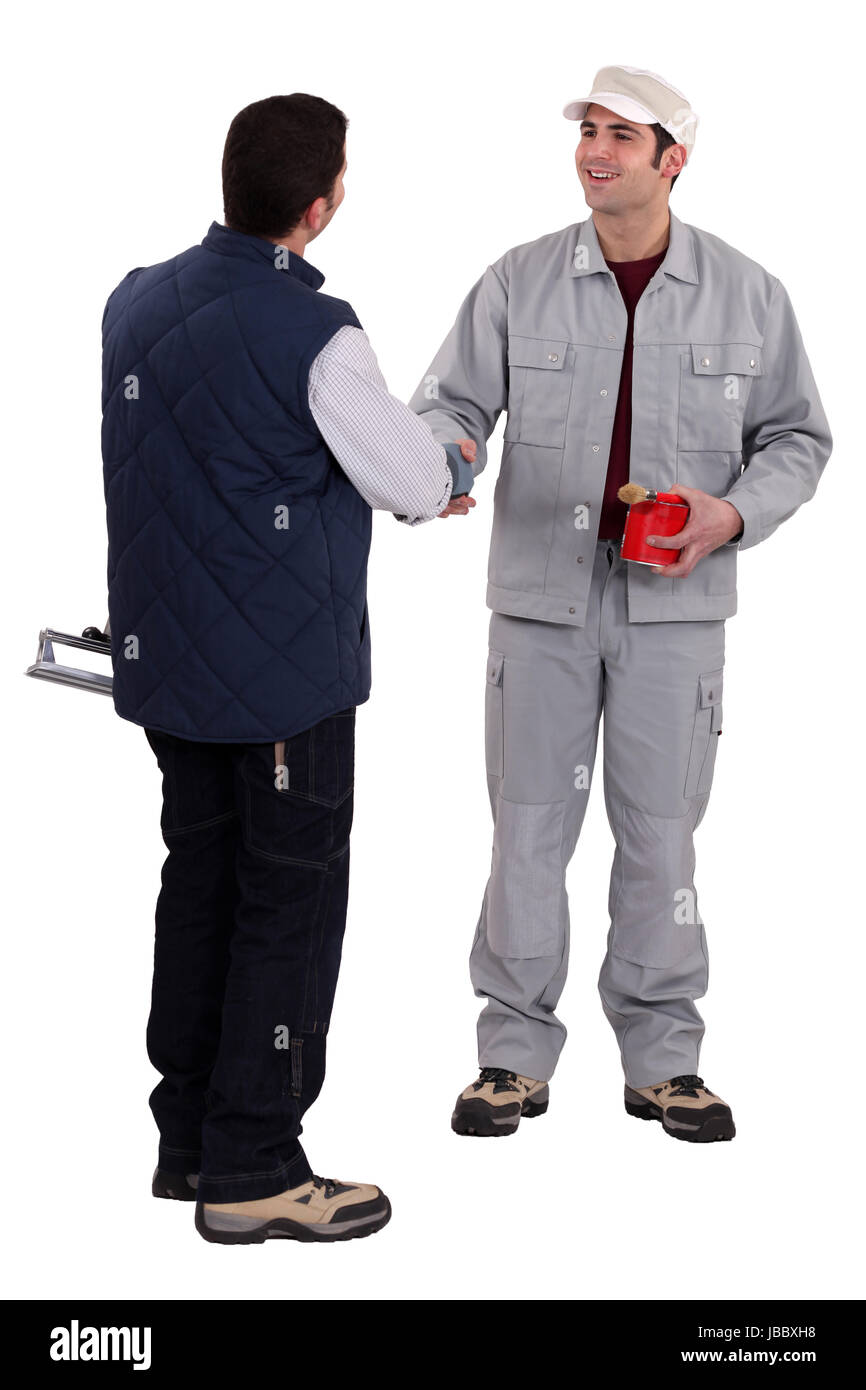 Two manual worker stood together Stock Photo - Alamy