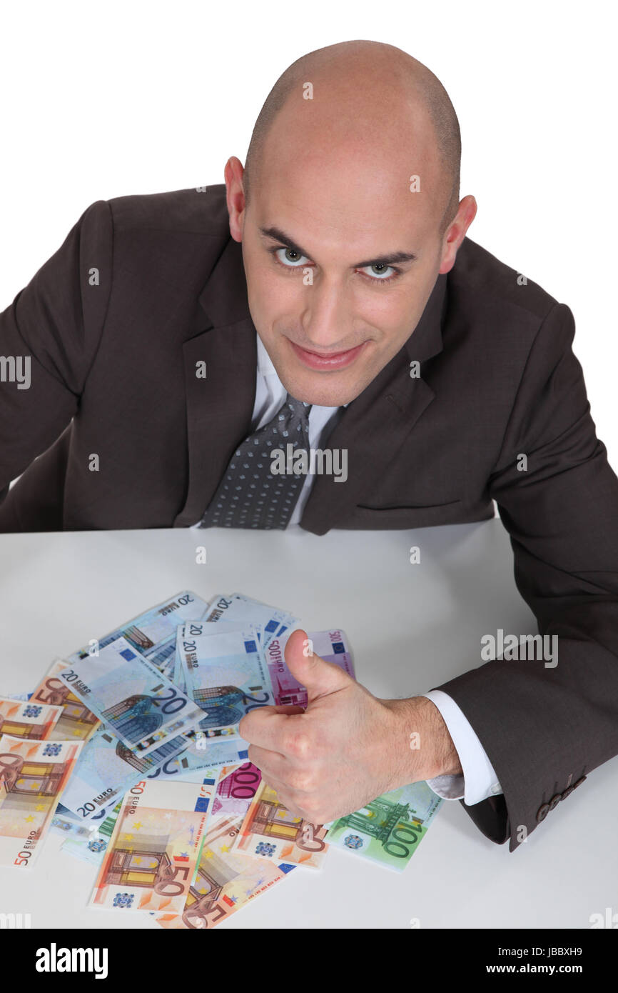 Man counting money Stock Photo - Alamy
