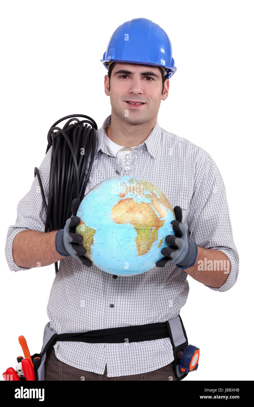 craftsman holding a globe Stock Photo - Alamy