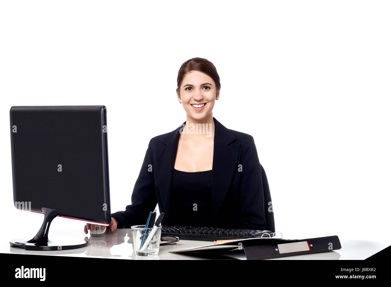 Business executive at her work desk. Indoor studio shot Stock Photo - Alamy