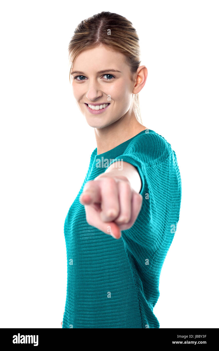 Charming young girl pointing towards the camera Stock Photo - Alamy