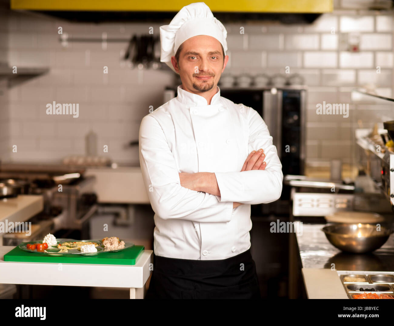 Male chef posing hands crossed hi-res stock photography and images - Alamy