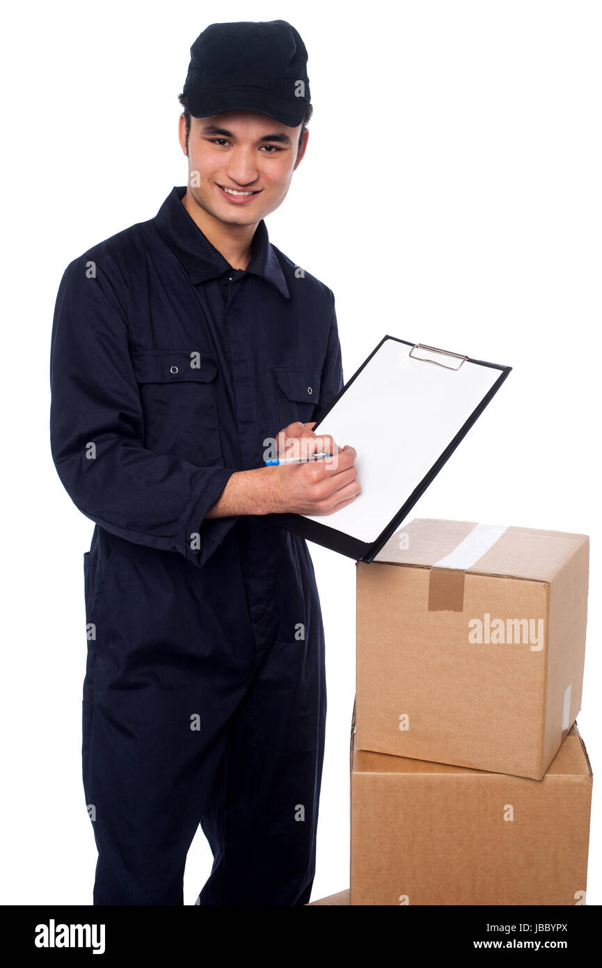 Young smart delivery man at work, isolated over white Stock Photo - Alamy