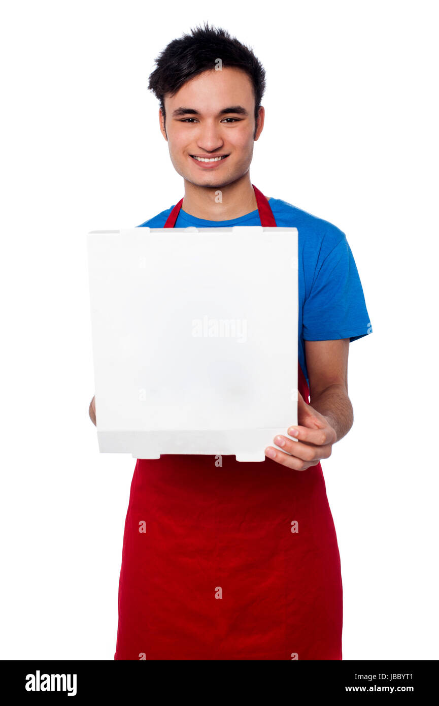 Isolated male chef on white background holding pizza box Stock Photo ...