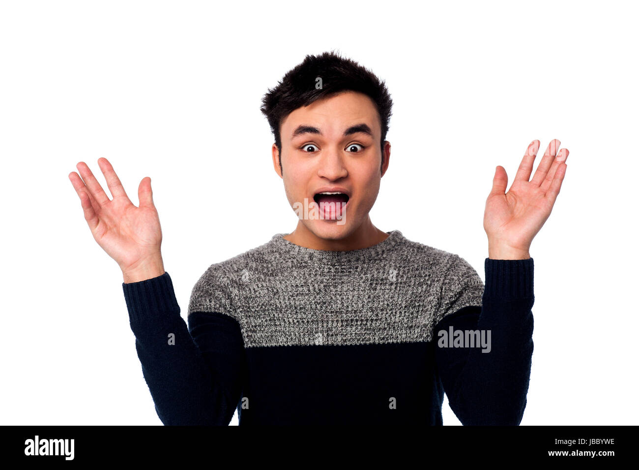 Surprised young male over white background Stock Photo - Alamy