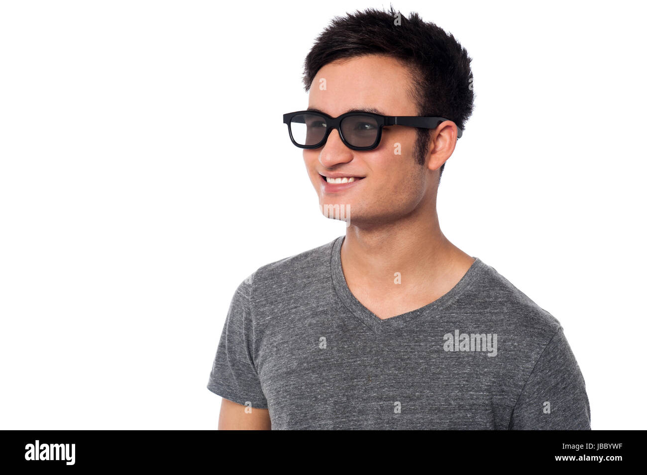 Smiling young boy wearing shades and looking away Stock Photo - Alamy