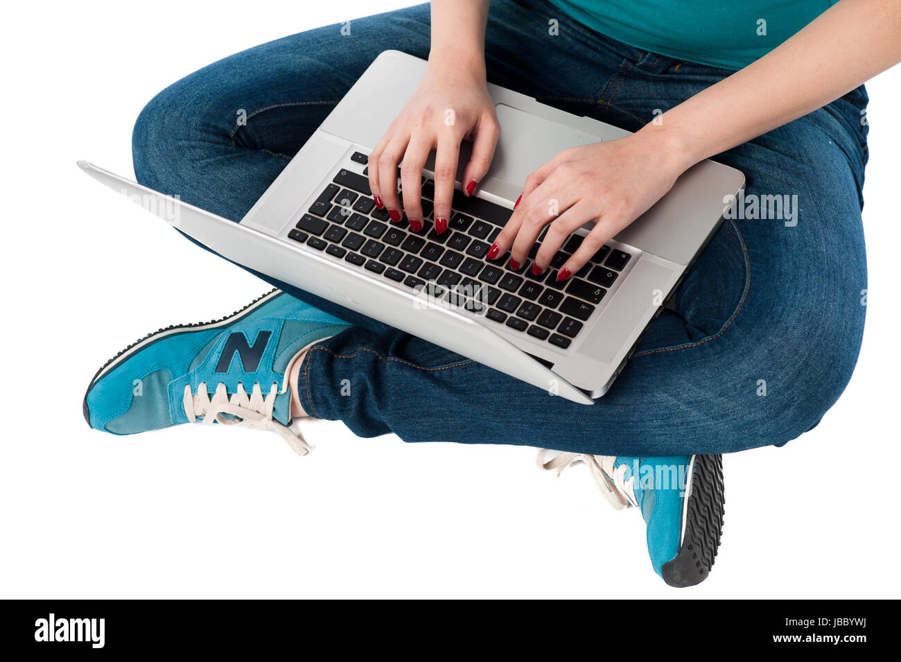 Female working on laptop, typing project report Stock Photo - Alamy