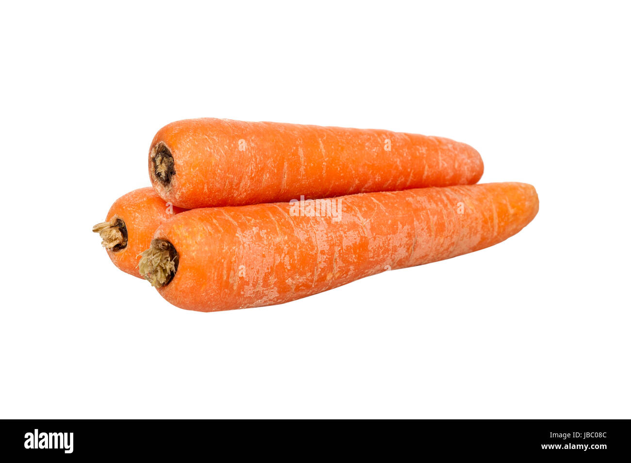 Ripe carrots isolated on a white background Stock Photo - Alamy
