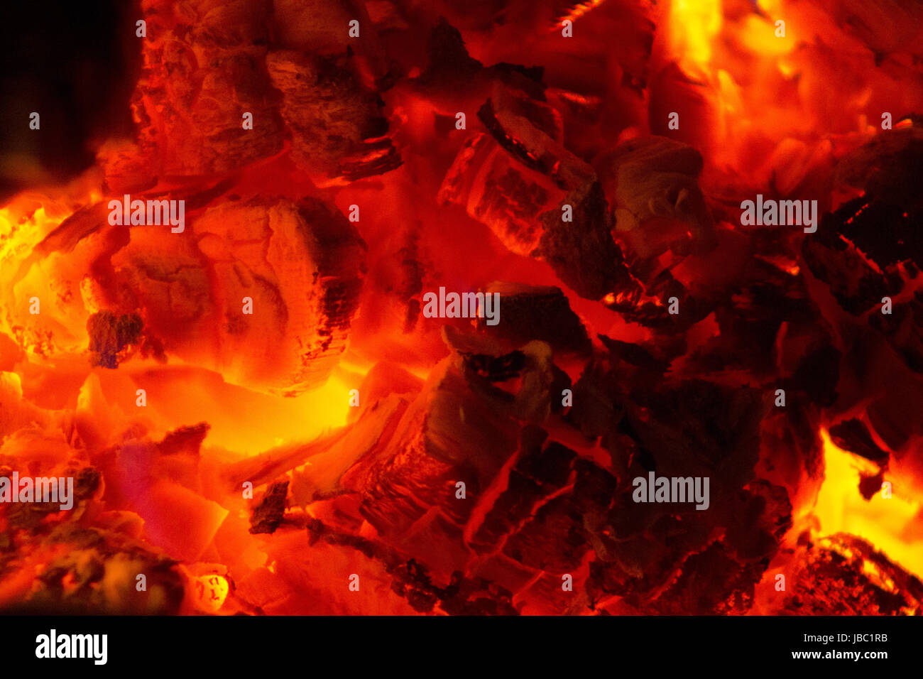 Fire place detail of a fire burning inside Stock Photo - Alamy