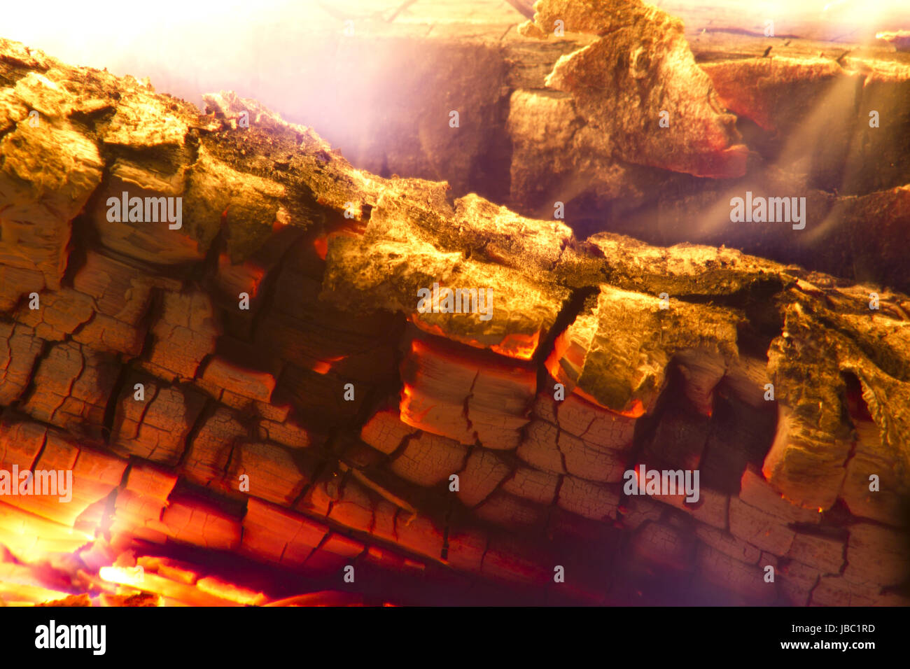 Fire place detail of a fire burning inside Stock Photo - Alamy