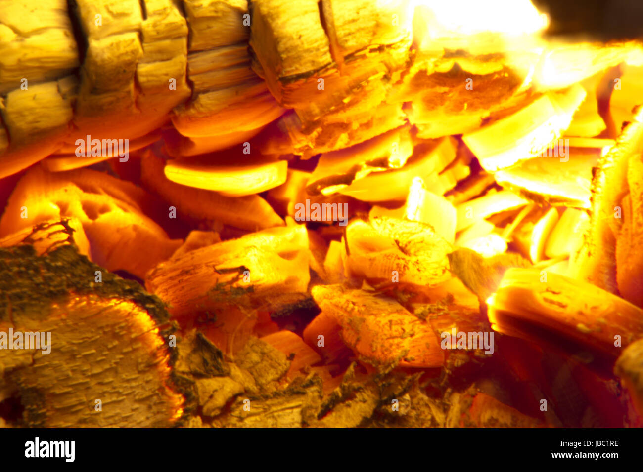 Fire place detail of a fire burning inside Stock Photo - Alamy