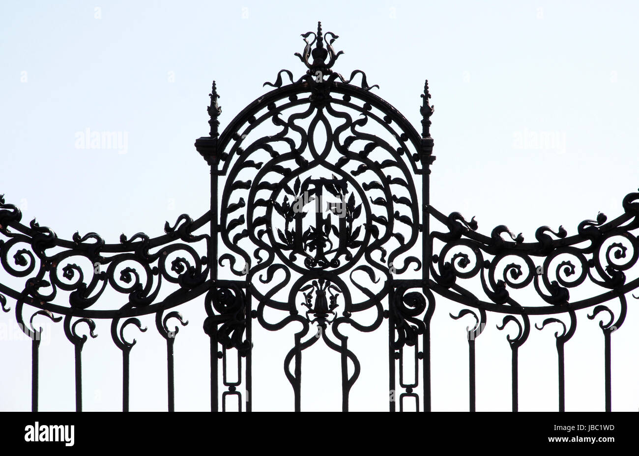 Forged decorative black metal fence castle entrance Stock Photo - Alamy