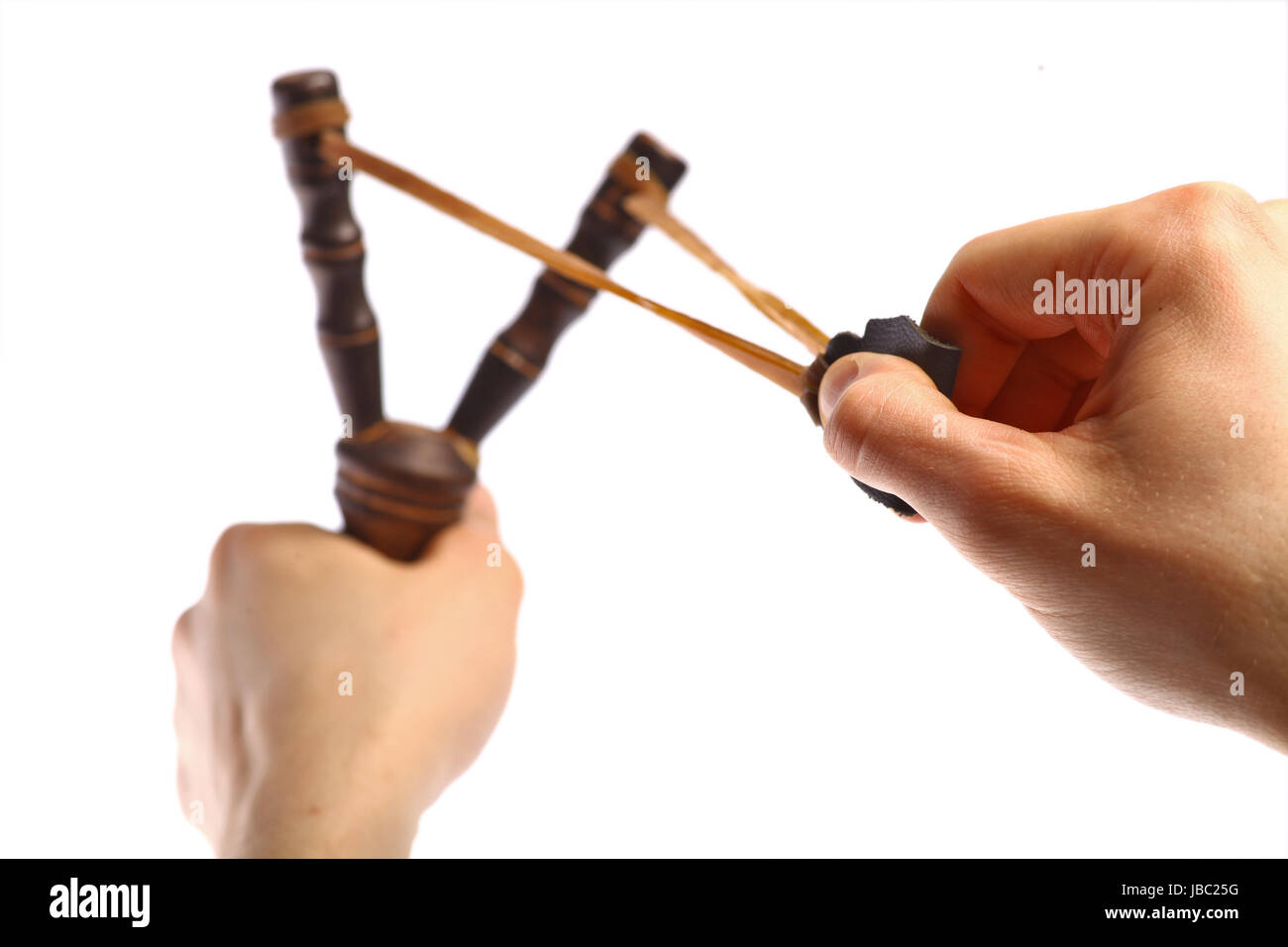 Color shot of a vintage slingshot, on white Stock Photo - Alamy