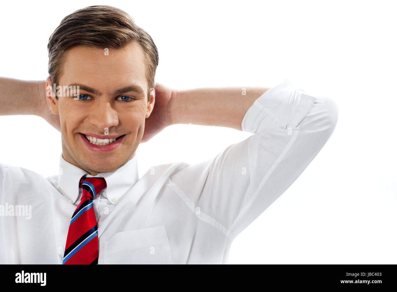 Relaxed smiling executive isolated on white, closeup shot Stock Photo ...