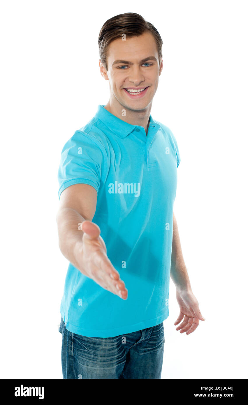 Charming young boy offering handshake isolated on white background ...