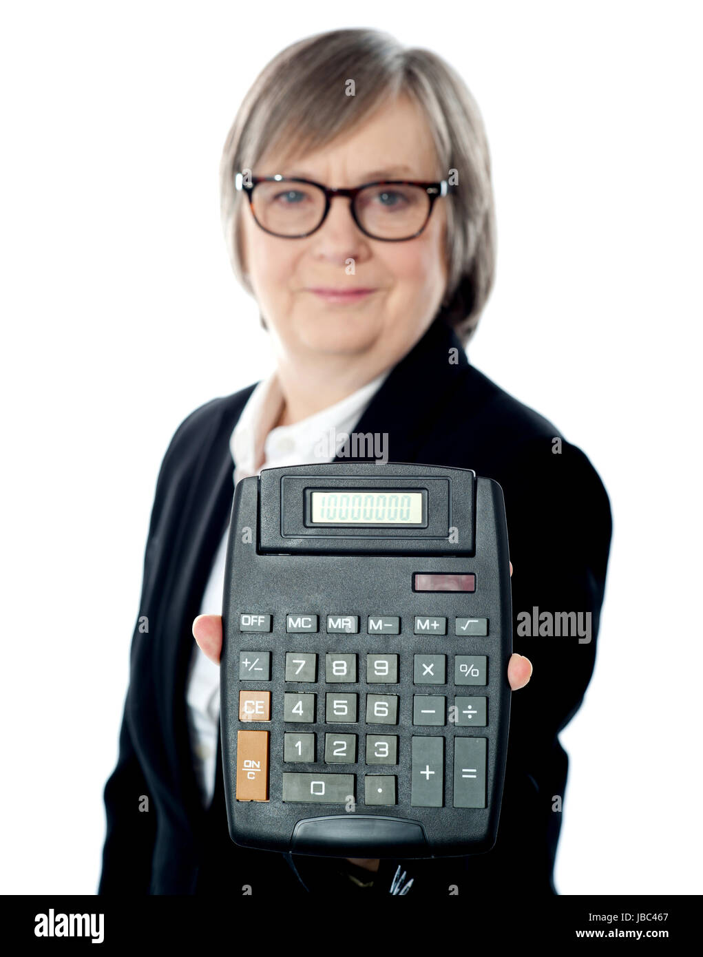 Business professional showing calculator to camera. Isolated on white ...