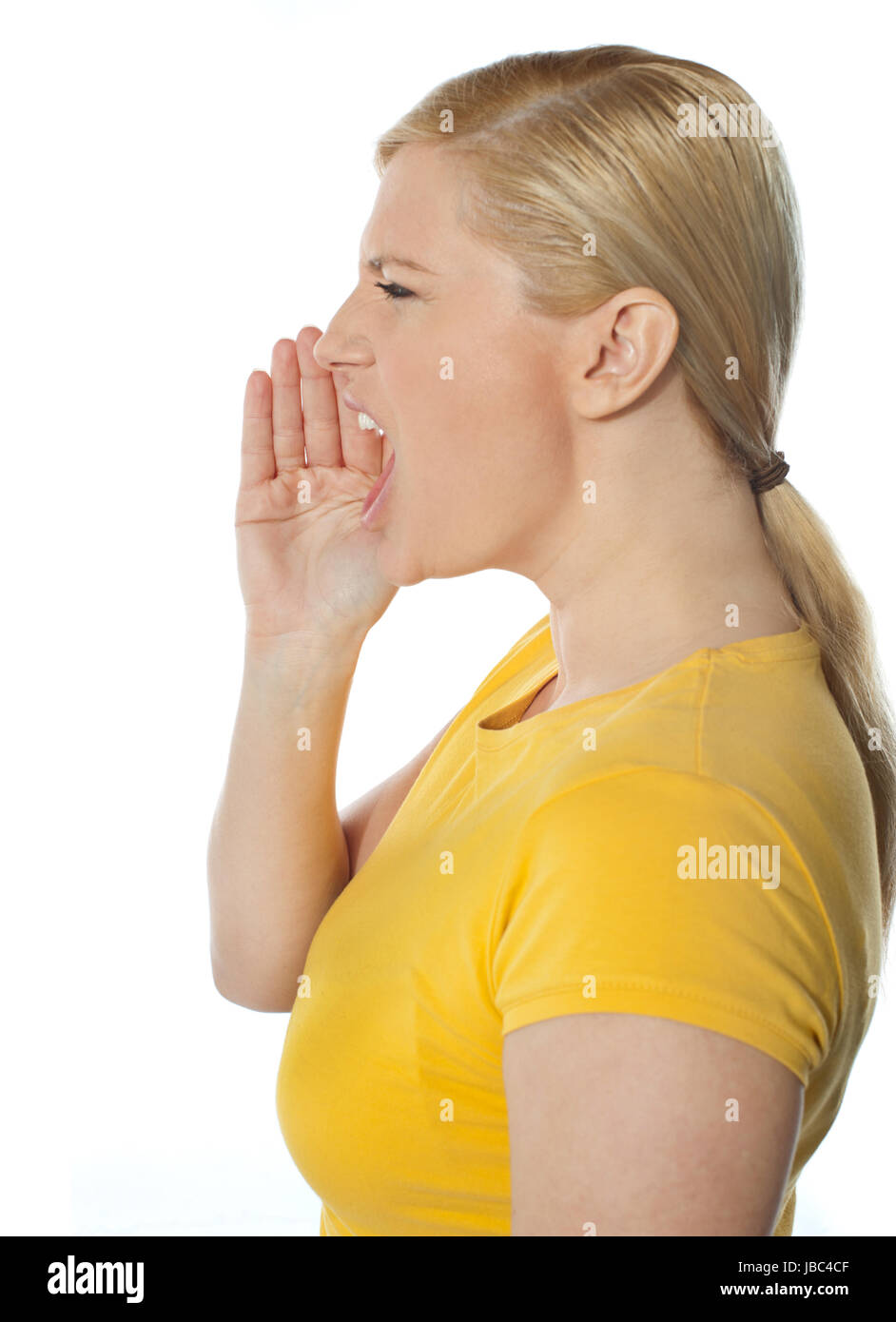 Side view of shouting teenager isolated over white background Stock ...
