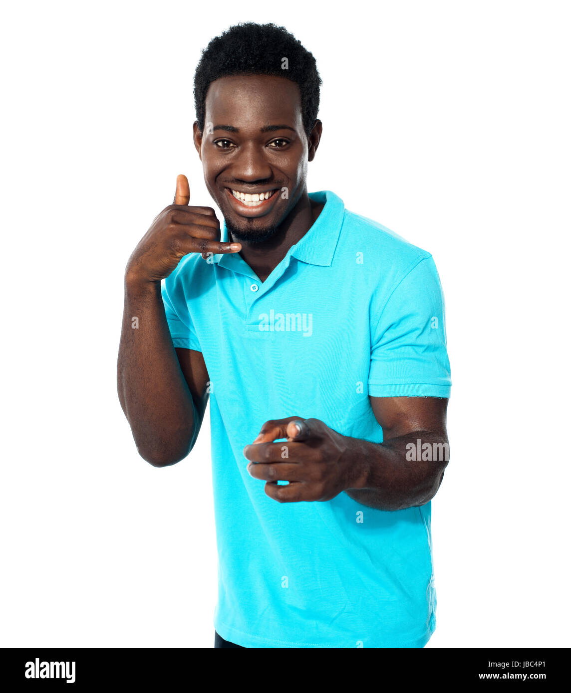 Smart african guy doing a call gesture and pointing at you Stock Photo ...