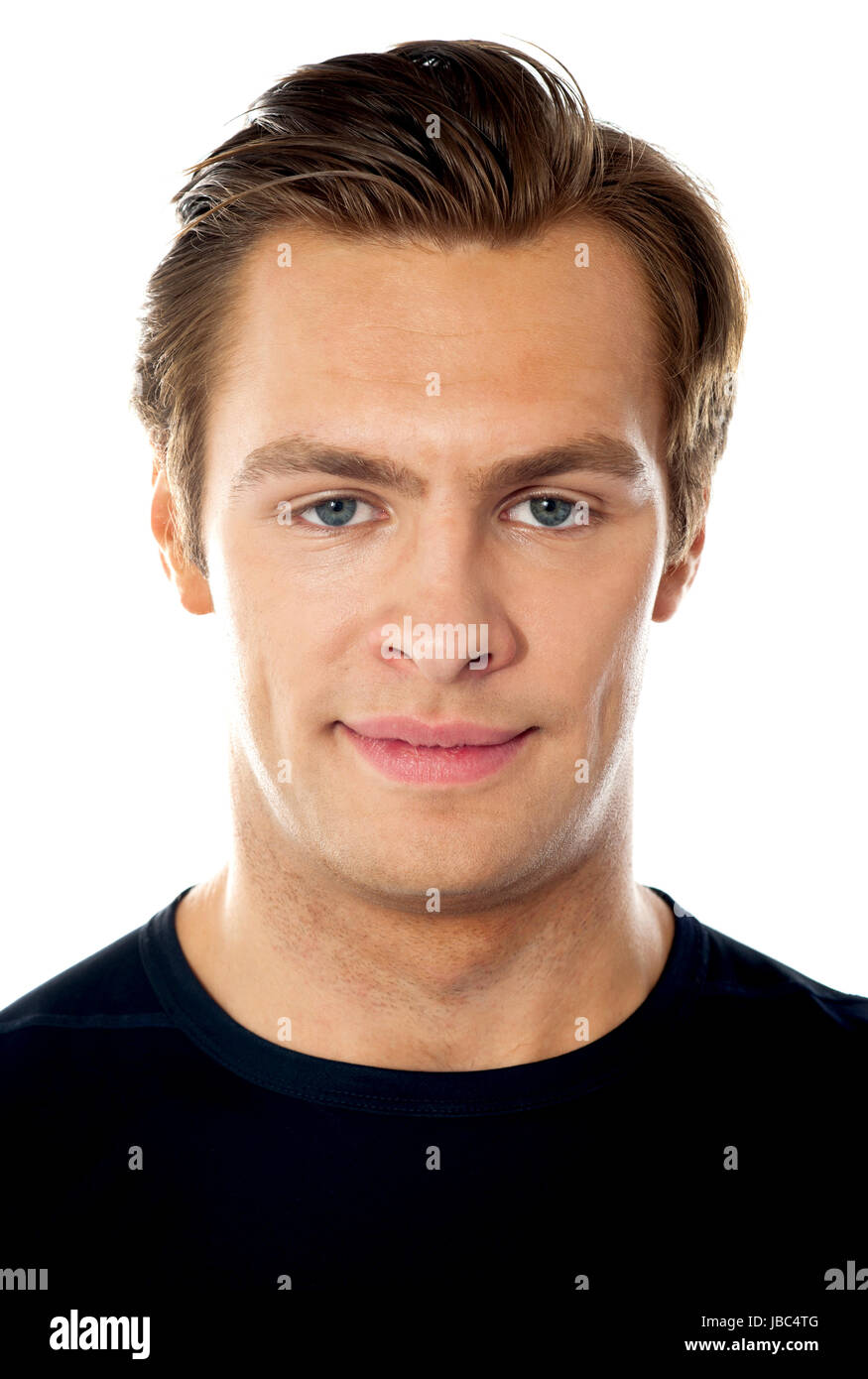 Handsome young man looking at you. Isolated background Stock Photo - Alamy