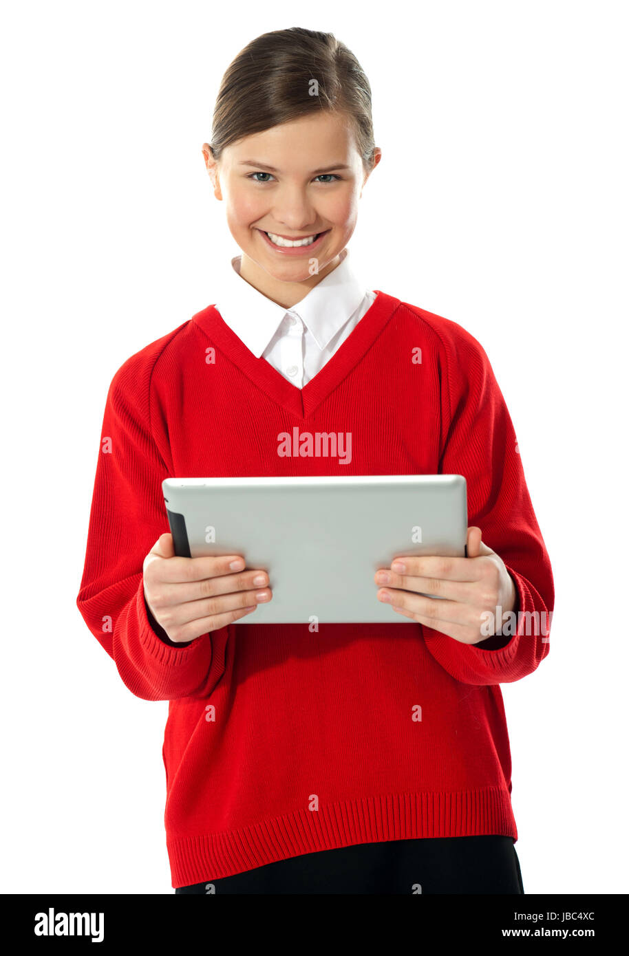 School Girl Holding Tablet Computer Isolated On White Background Stock
