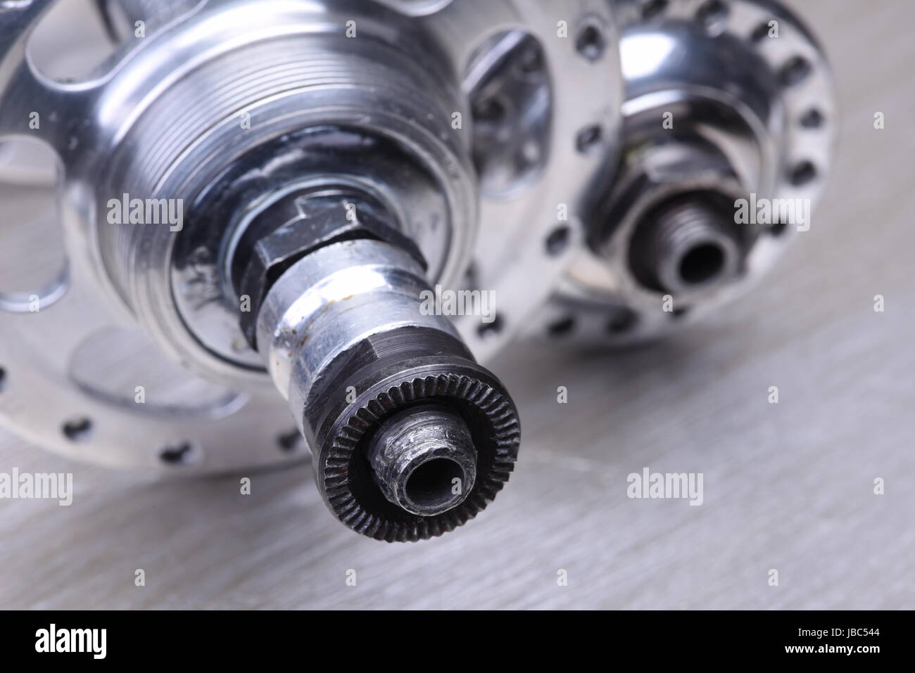 Old bike hub closeup, service of vintage steel bike Stock Photo - Alamy