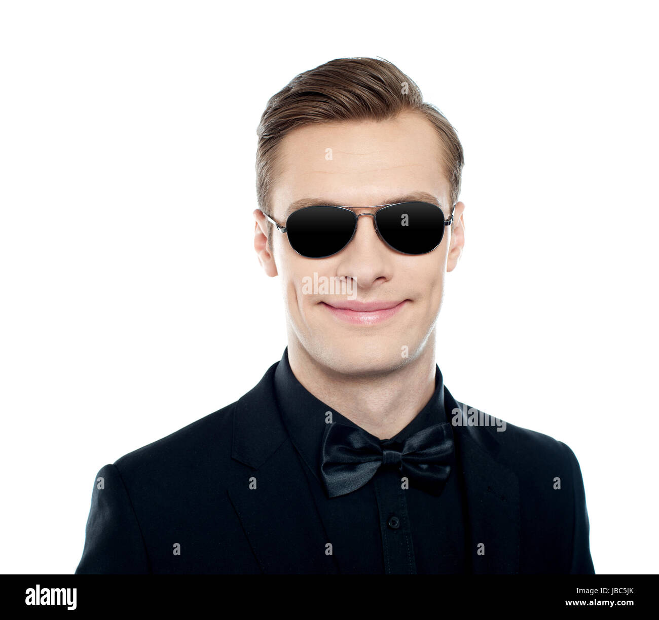 Trendy young male model wearing goggles and smiling Stock Photo - Alamy